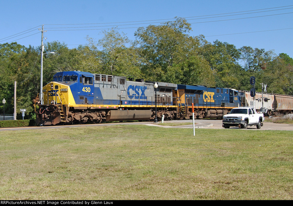 M735-25 passing my ex NS Hy-railer